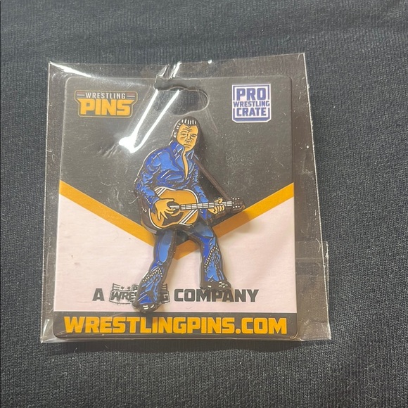 WWE | Accessories | Wwe Blue And Black Wrestling Pin | Poshmark